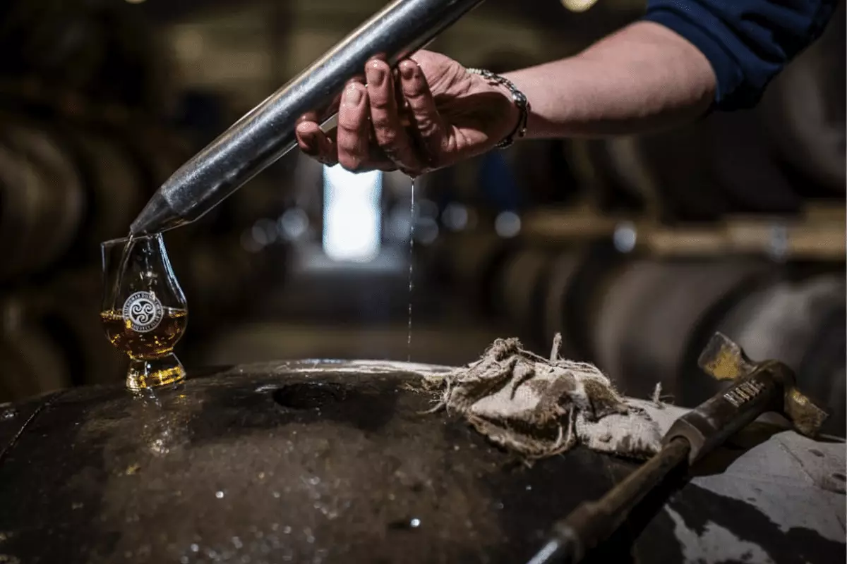 Kilchoman distillery loch gorm pouring